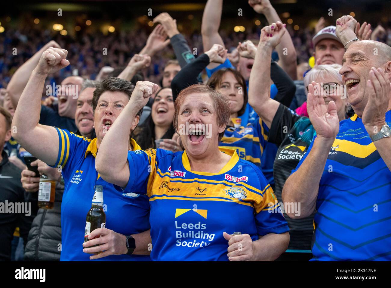 The Leeds Rhinos supporters celebrate as their team score their first ...