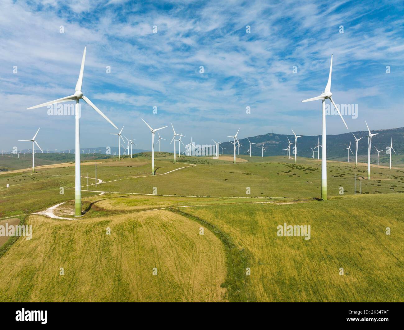 Windmills on a wind farm near Zahara de los Atunes, aerial view, drone ...