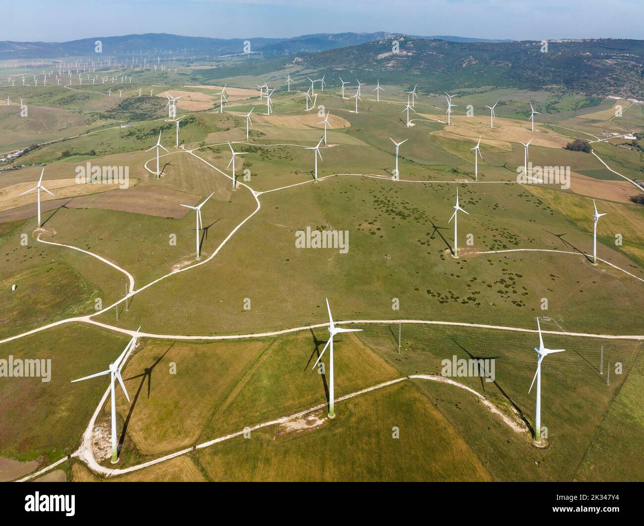 Windmills on a wind farm near Zahara de los Atunes, aerial view, drone ...