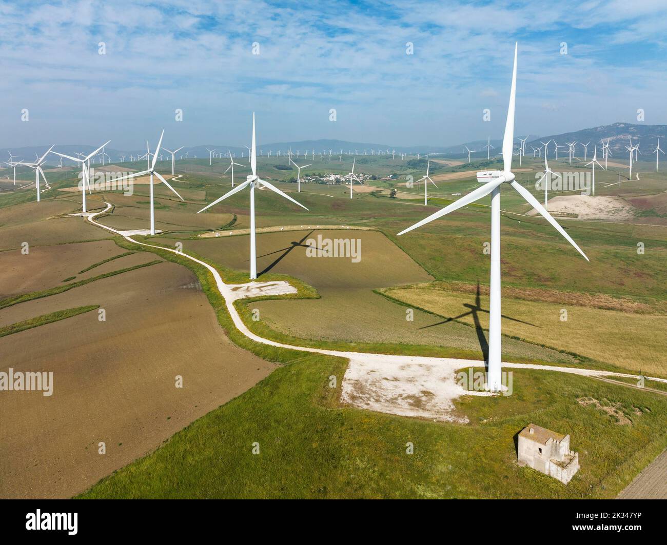 Windmills on a wind farm near Zahara de los Atunes, aerial view, drone ...