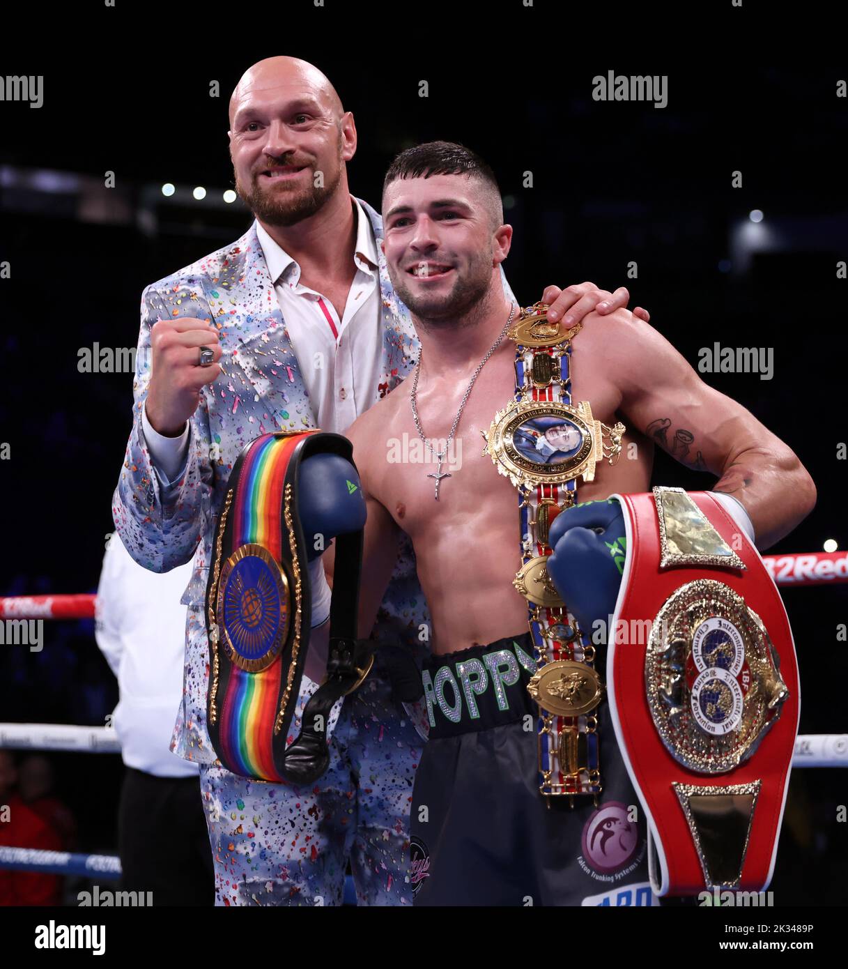Mark Heffron (right) celebrates victory with Tyson Fury after the ...