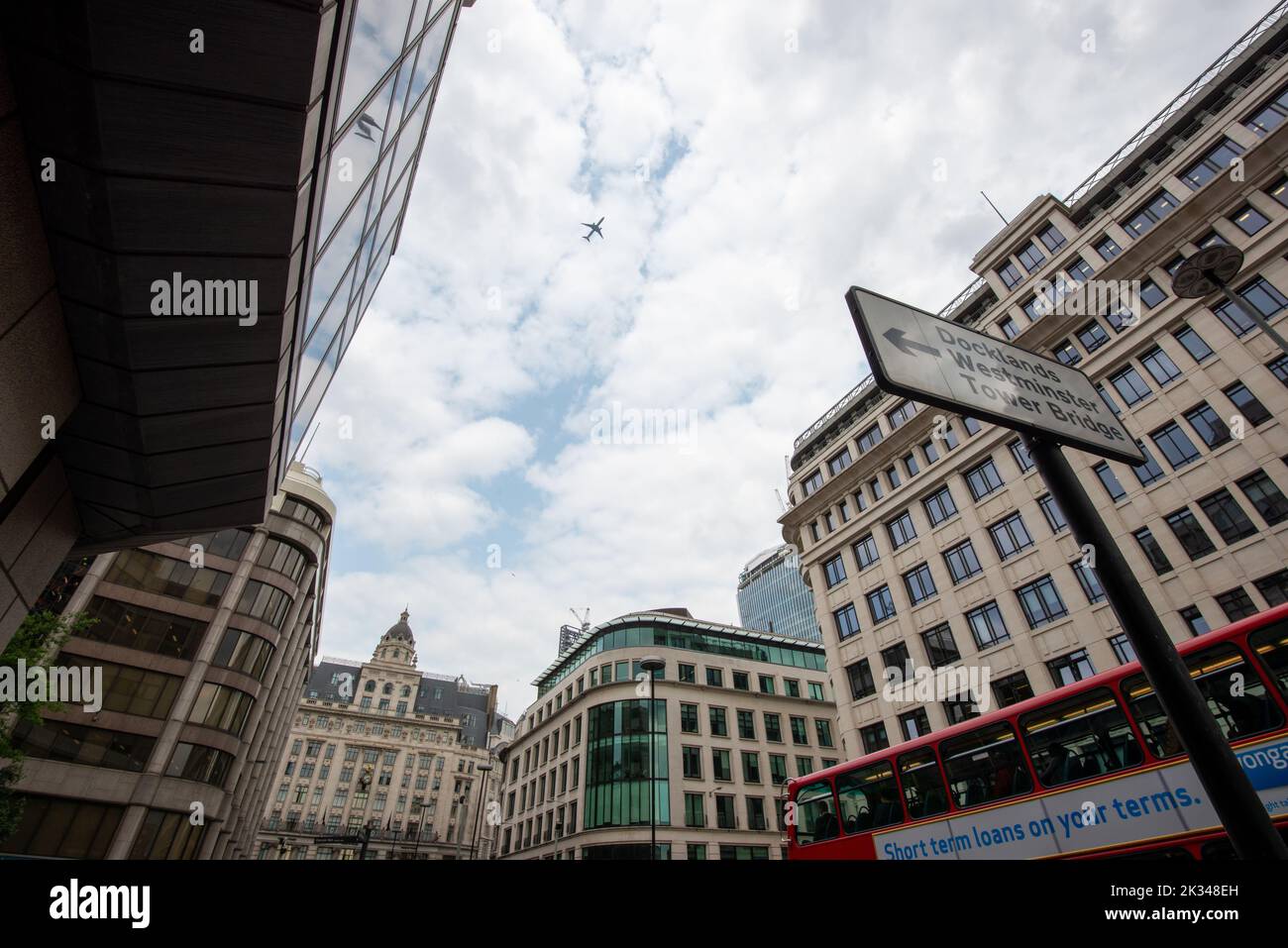 Sign posting to Docklands, Westminster and Tower Bridge with a iconic ...