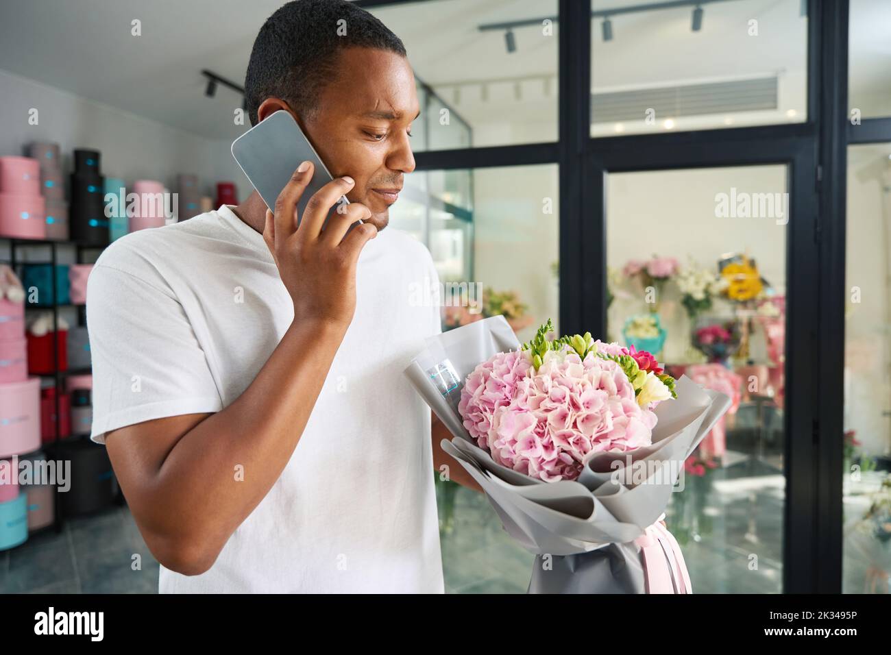 African american man flowers talking hi-res stock photography and ...