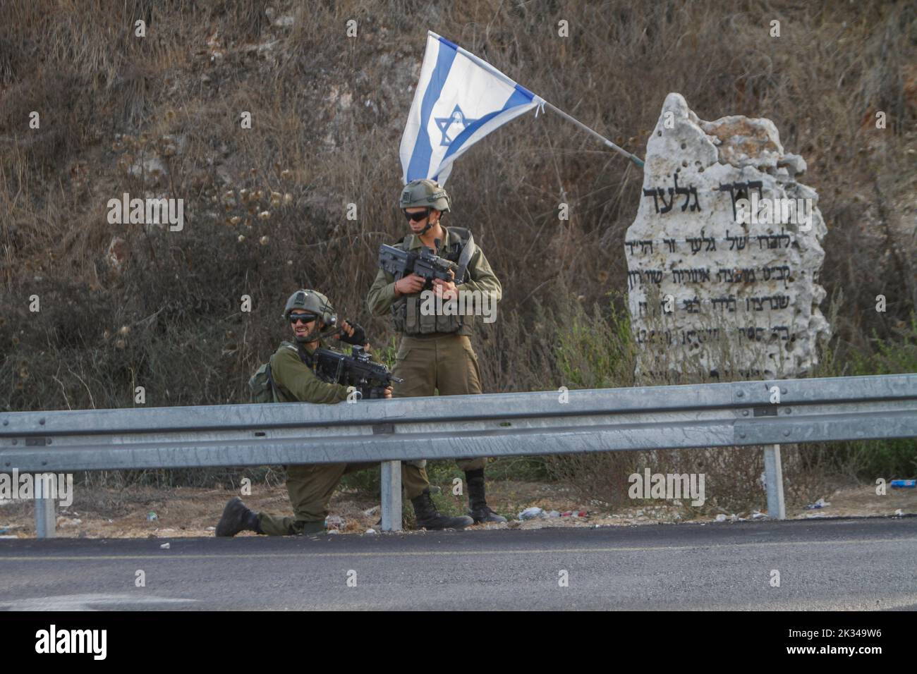 Israeli soldiers guarding at a checkpoint close to where a Palestinian, who they claim tried to ...