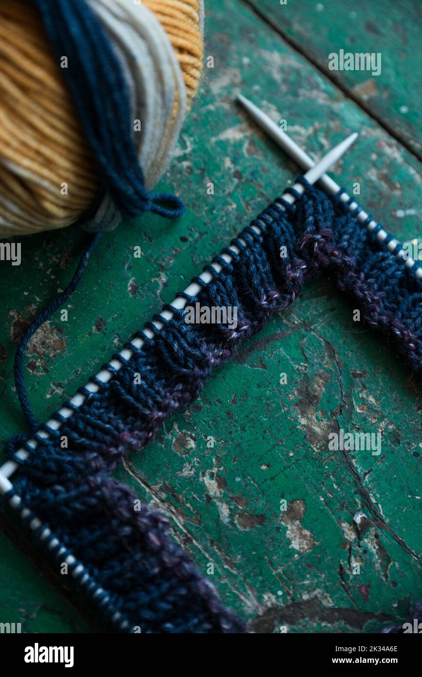 Handwork, started knitting with needle play Stock Photo - Alamy