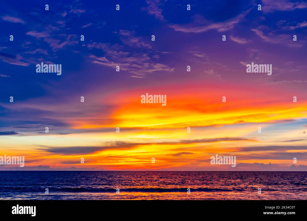 Beautiful stunning colorful and golden sunset in yellow orange red ...