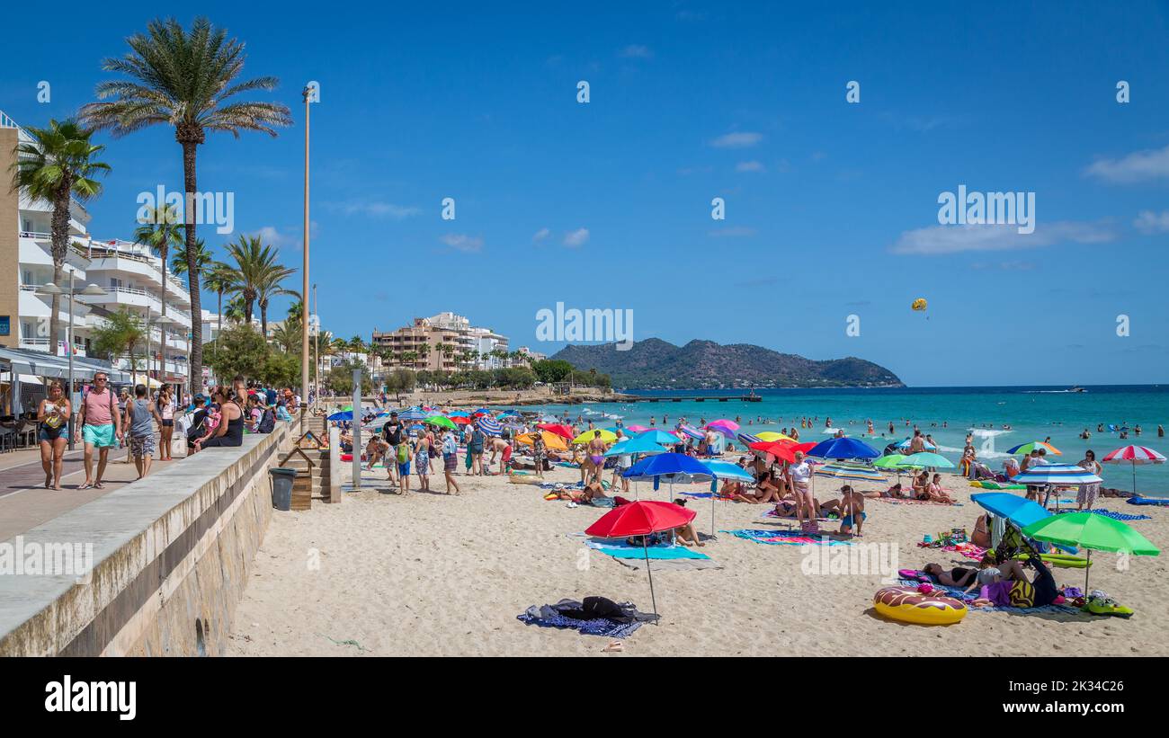 Lively Playa de Sant Llorenc beach and promenade, Cala Millor, Majorca ...