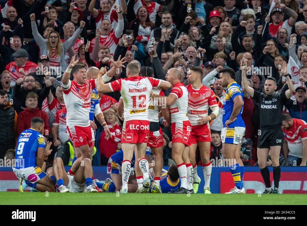 Konrad Hurrell #23 of St Helens celebrates his try and makes the score ...