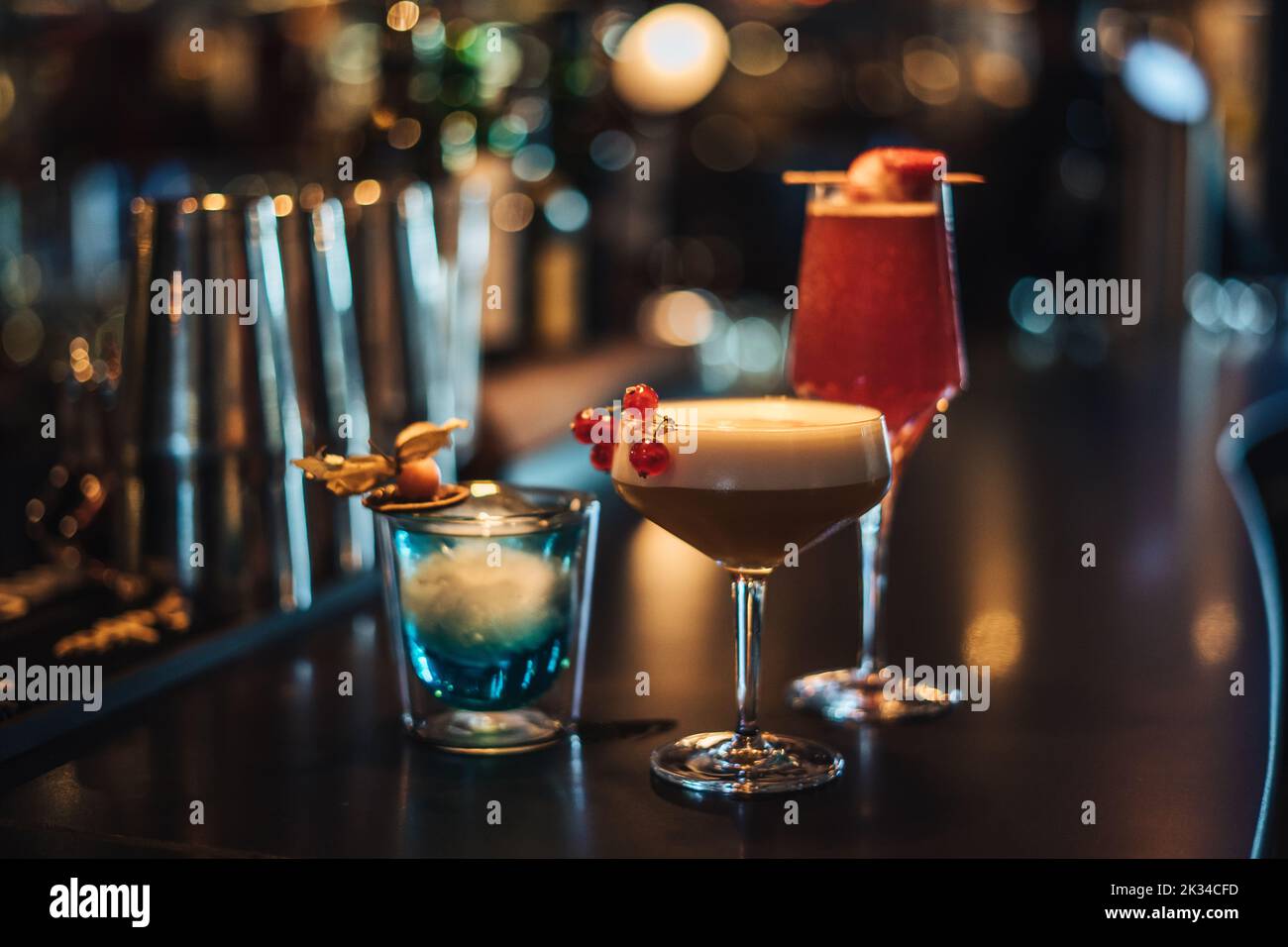 photo of three cocktails in a bar after a bartender prepared them Stock ...
