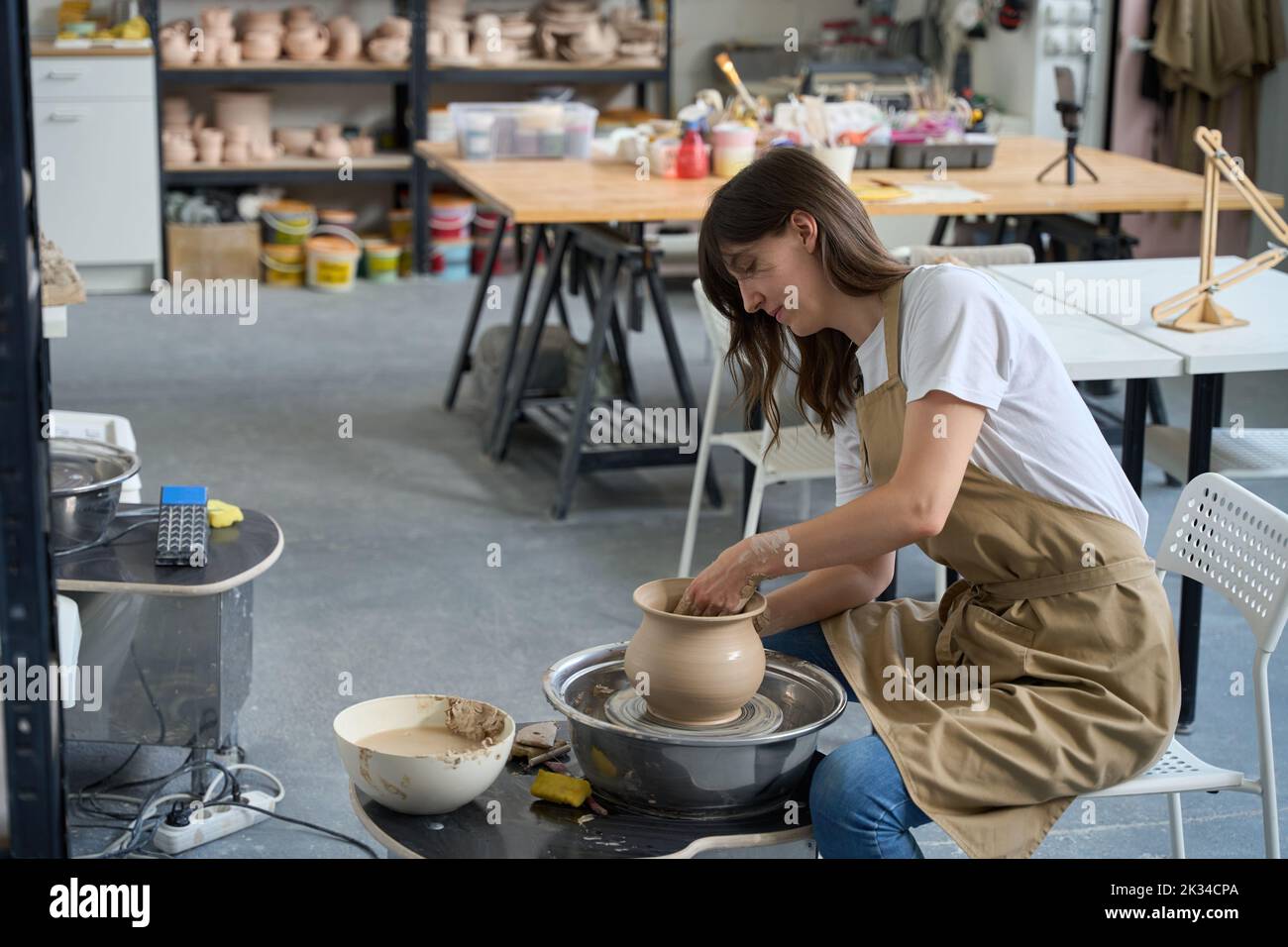 Pottery making on spinning table hi-res stock photography and images ...
