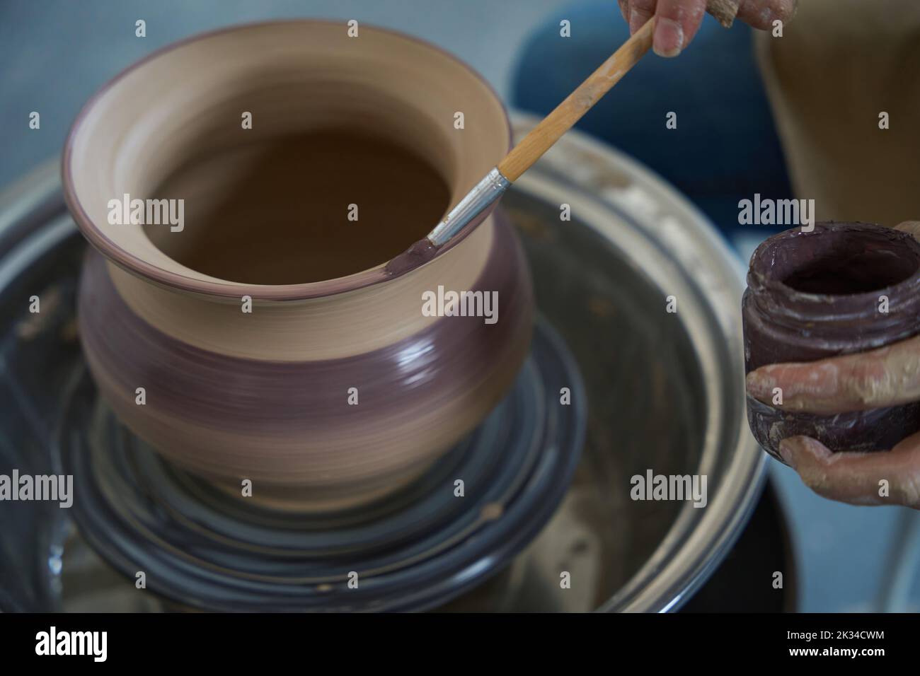 Work working potter clay craftsman pots ceramic hi-res stock ...