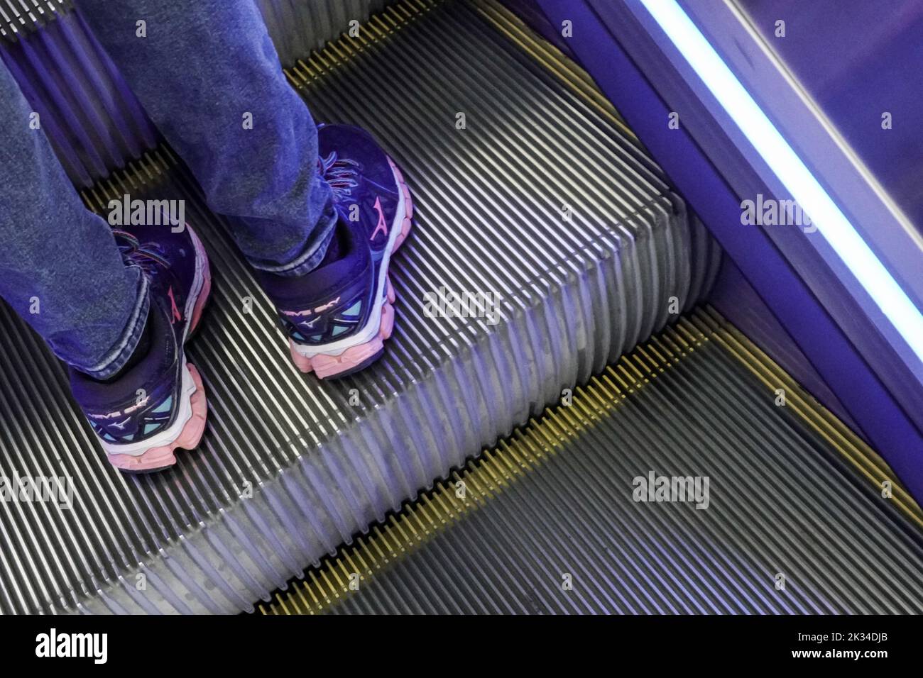 A woman’s feet on an escalator step Stock Photo - Alamy