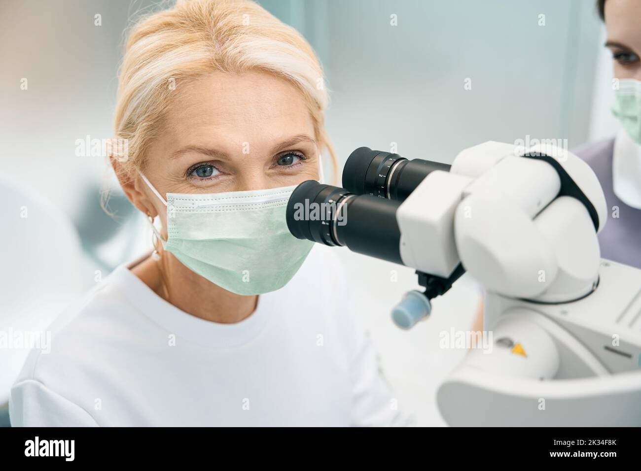 Woman finishing work on research in the laboratory Stock Photo - Alamy