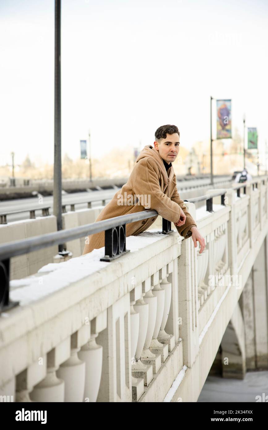 Leaning on bridge railing hi-res stock photography and images - Alamy