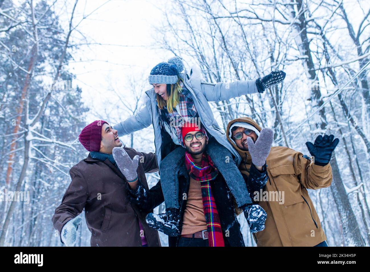 Outdoor lifestyle portrait of four best friends, smiling and having fun ...