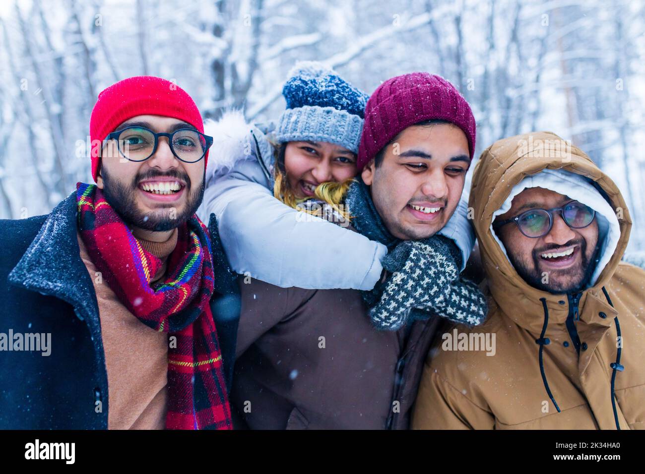 Outdoor lifestyle portrait of four best friends, smiling and having fun ...