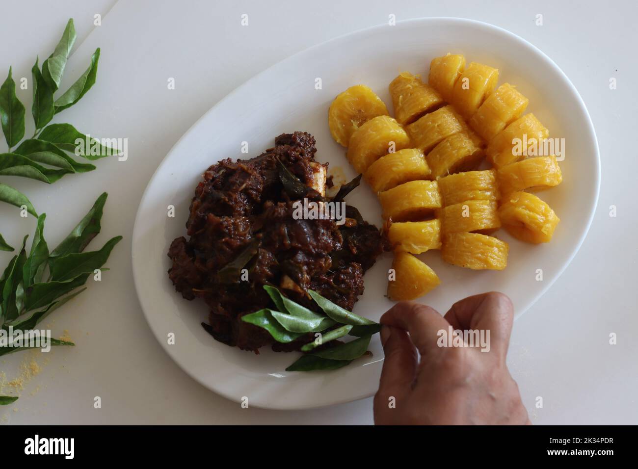 Mutton roast and steamed ripe plantain. A spicy and sweet combination ...