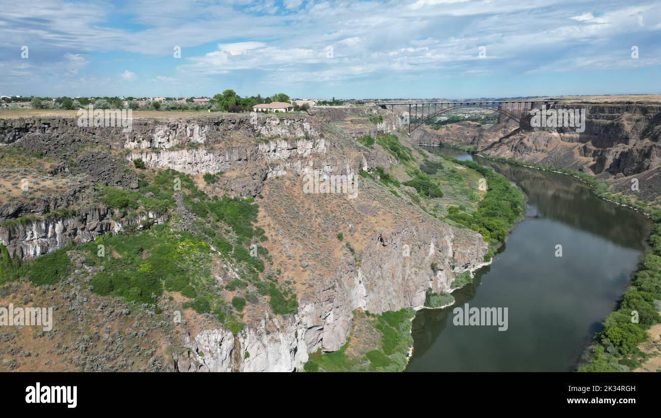 An aerial view of the river surrounded by rocks and cliffs Stock Photo ...