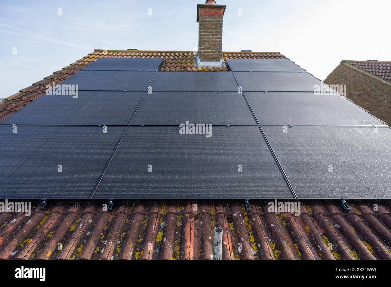 Solar PV panels on the roof of a house in the UK Stock Photo - Alamy