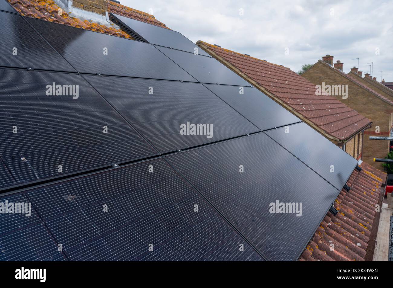 Solar PV panels on the roof of a house in the UK Stock Photo - Alamy