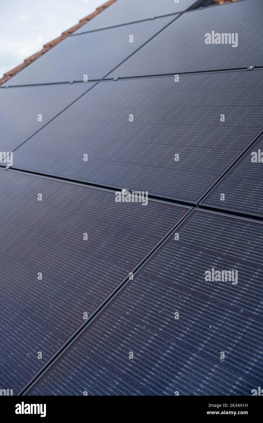 Solar PV panels on the roof of a house in the UK Stock Photo - Alamy