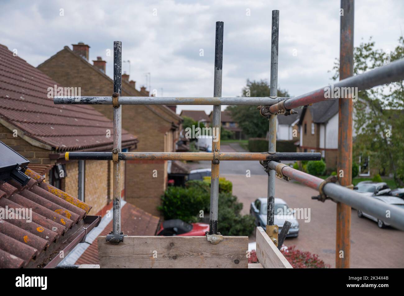 scaffolding around a house in the UK Stock Photo - Alamy