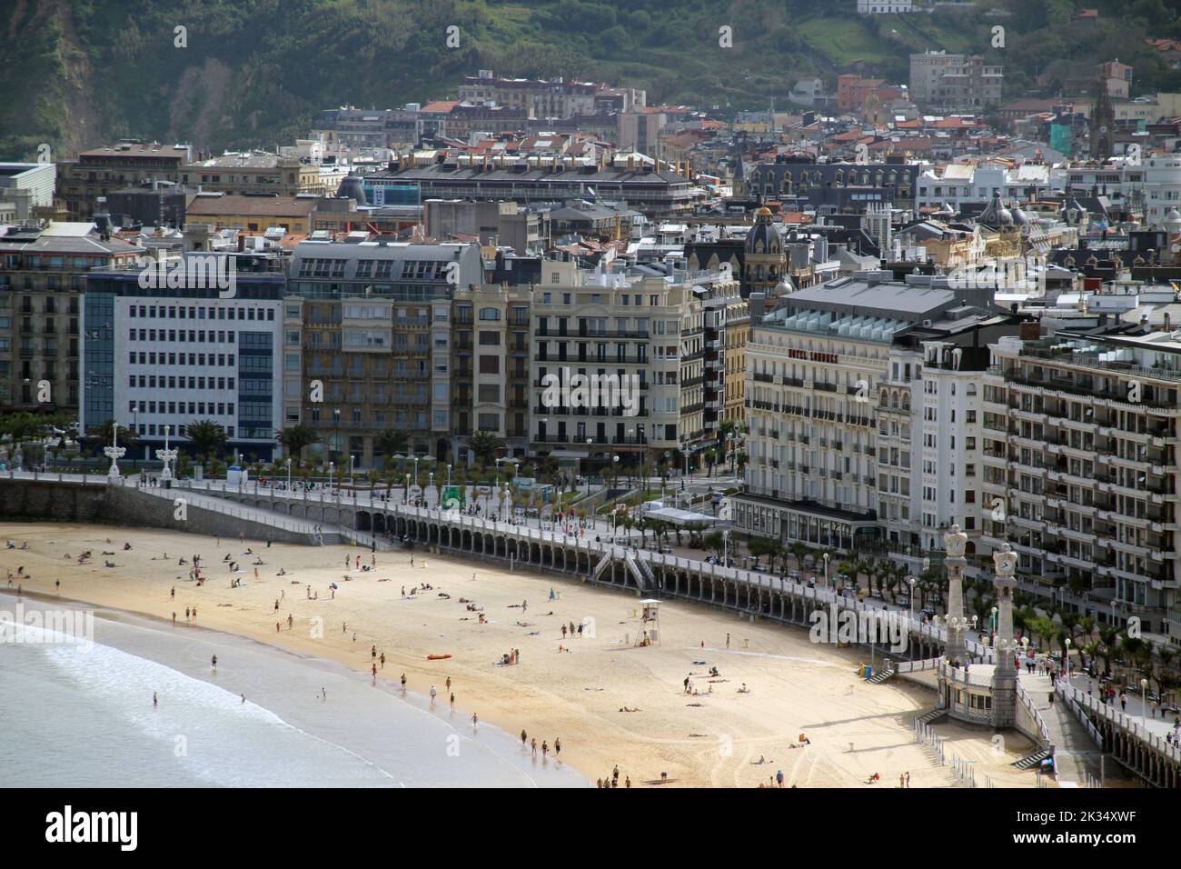 The cityscape of San Sebastian with a sandy beach in Spain Stock Photo ...