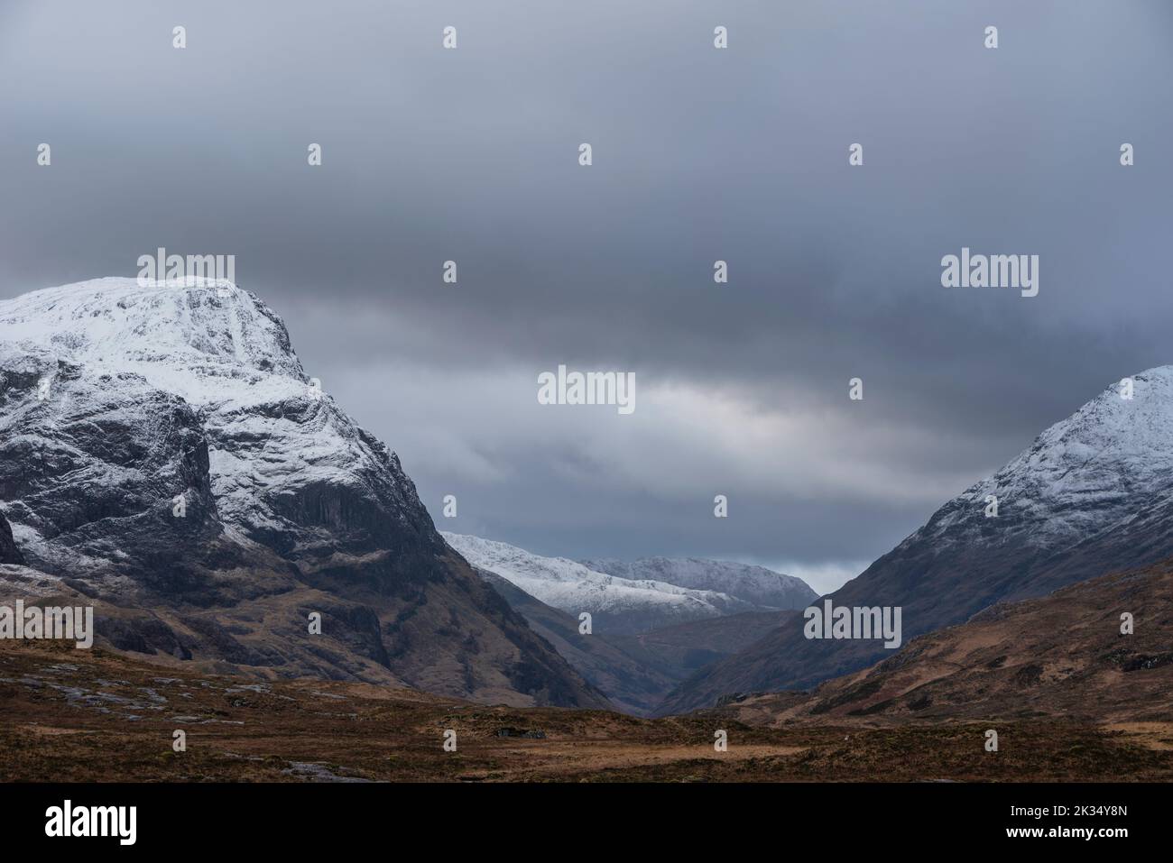 Epic Winter landscape image of snowcapped Three Sisters mountain range ...