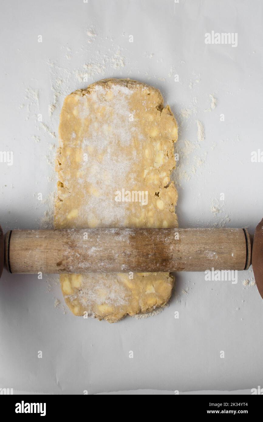 danish pastry dough being laminated, pastry dough with pieces of cold ...