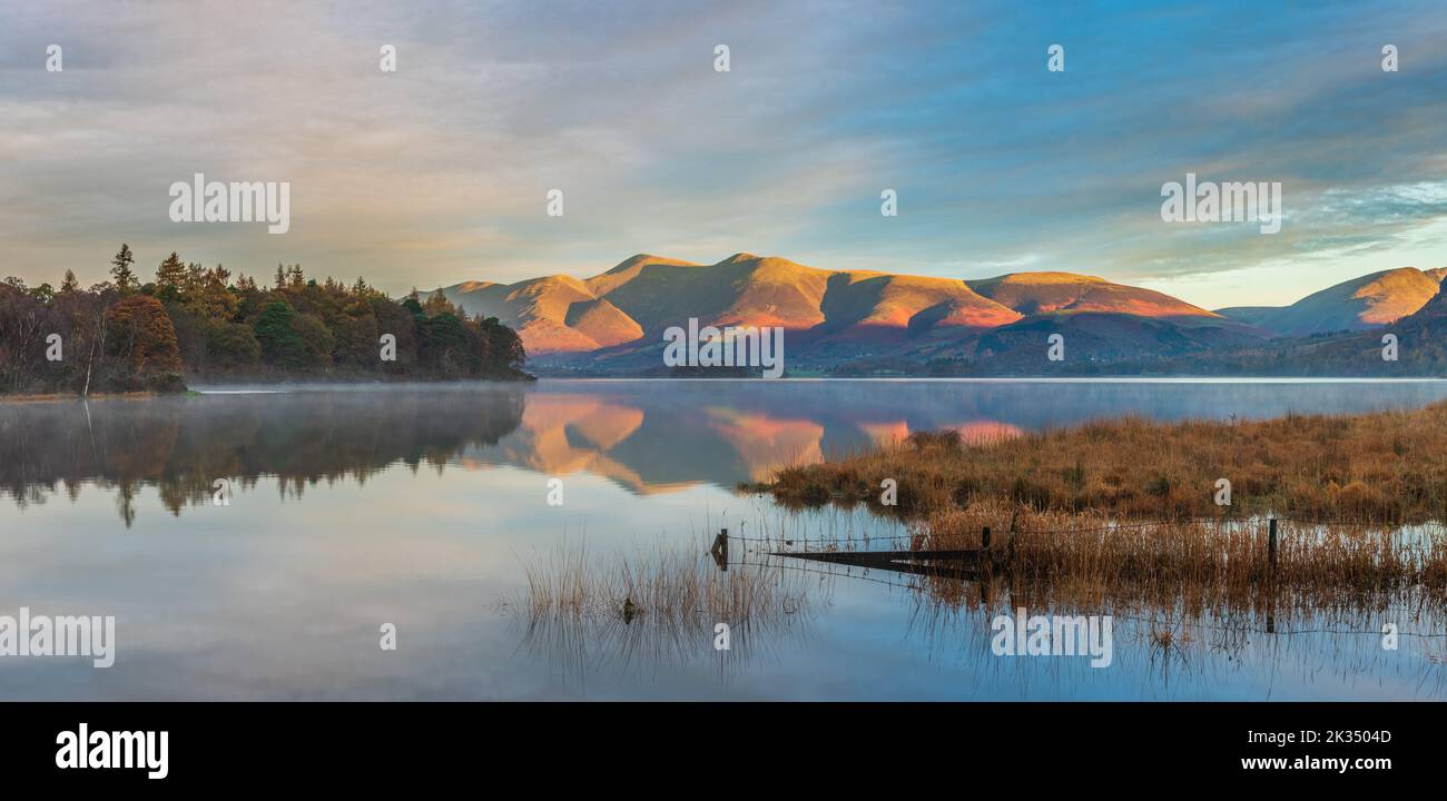 Epic Autumn sunrise landscape image looking from Manesty Park in Lake ...