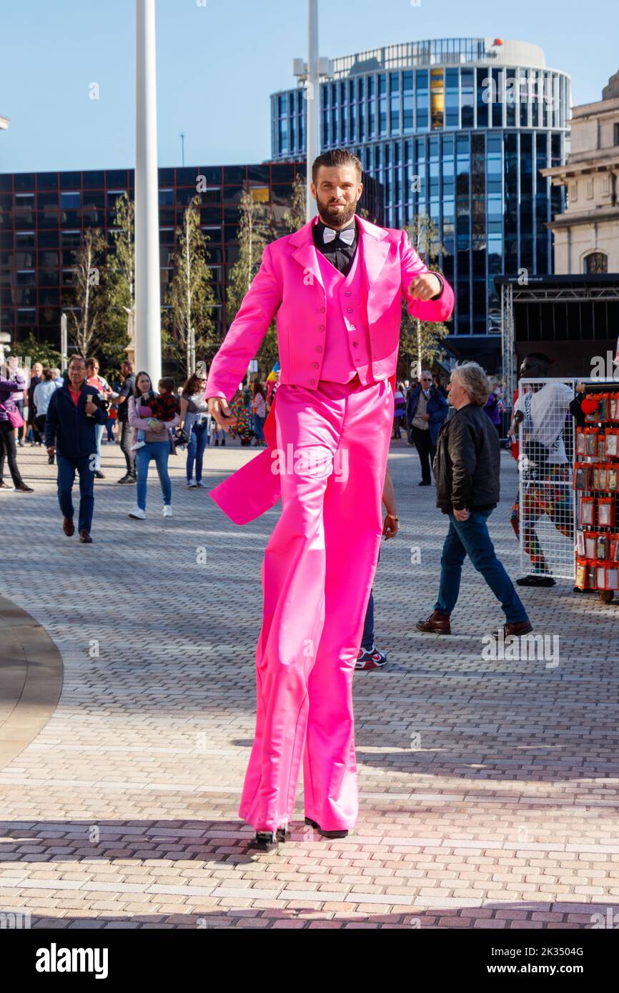 Bearded Man In Pink Suit On Stilts At Gay Pride Parade Protest 2022 In