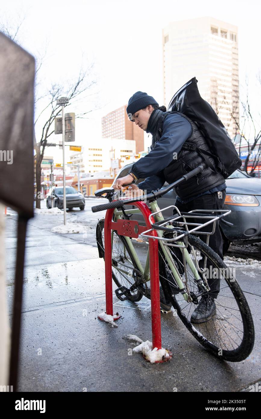 Person with bike hi-res stock photography and images - Alamy