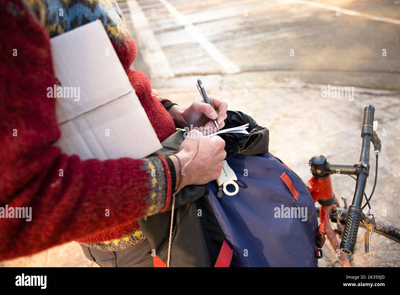 One writing in notebook hi-res stock photography and images - Alamy