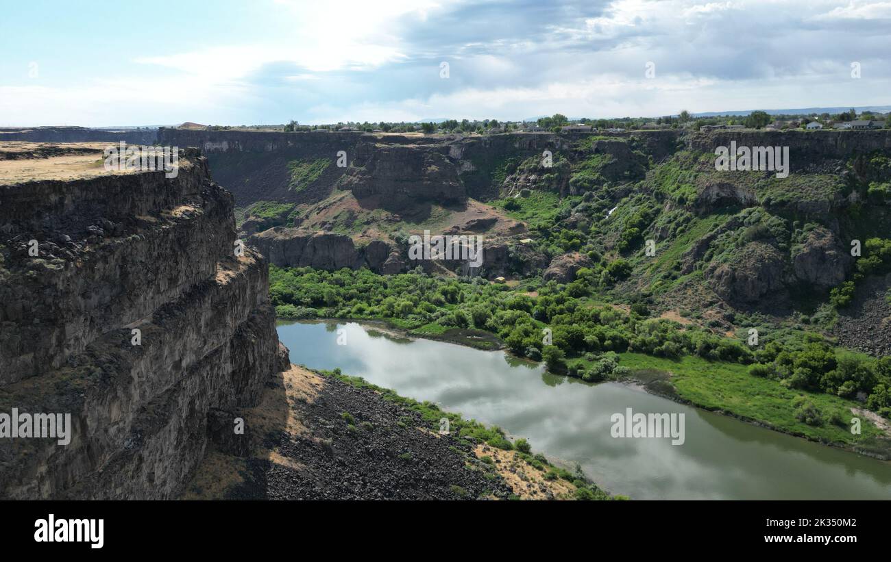 A beautiful view of a river surrounded by geological formations with ...
