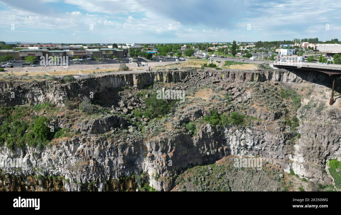 A bird's eye view of buildings built on top of a steep cliff with a ...