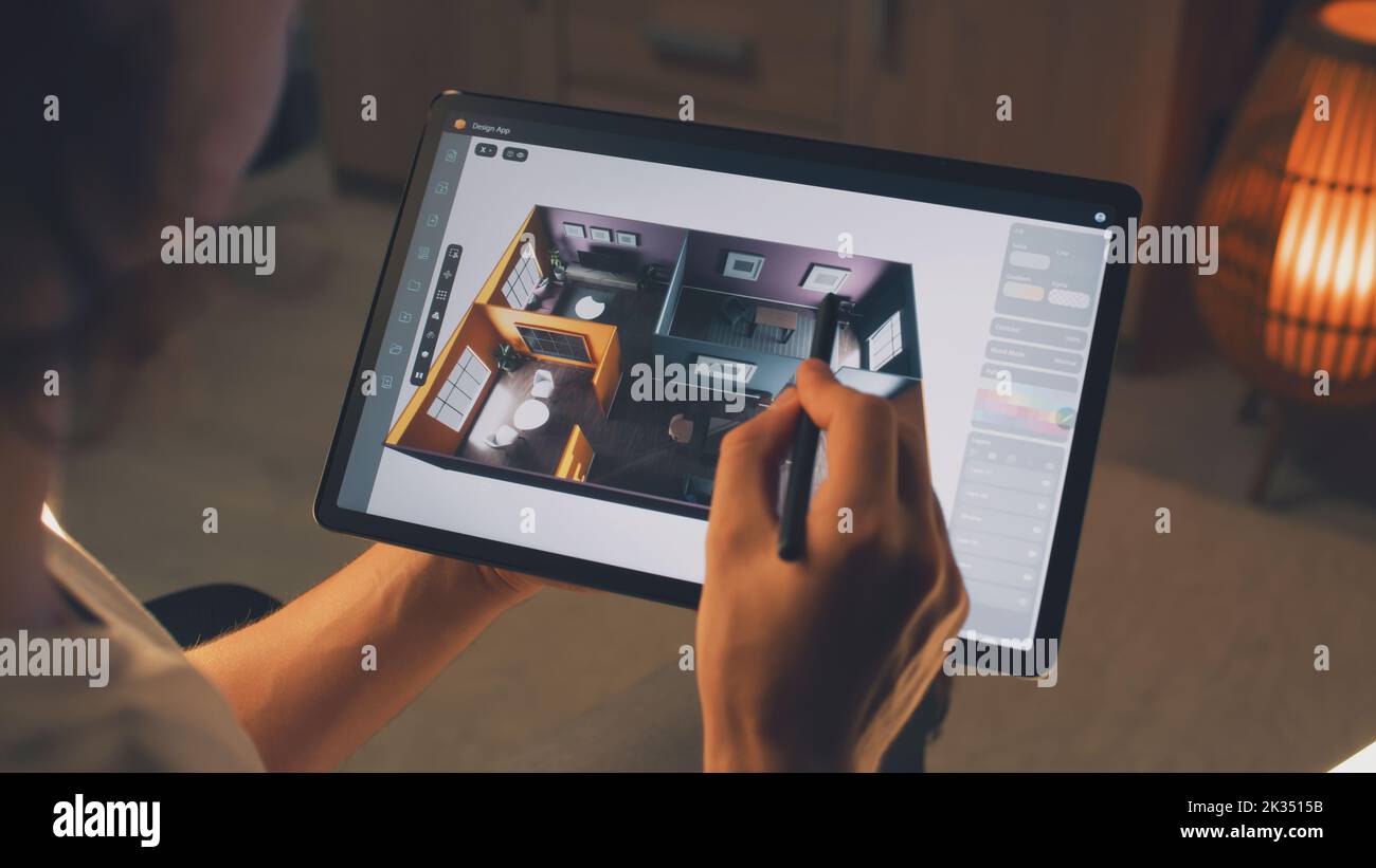 Male 3D designer using digital tablet computer and pencil and creating ...