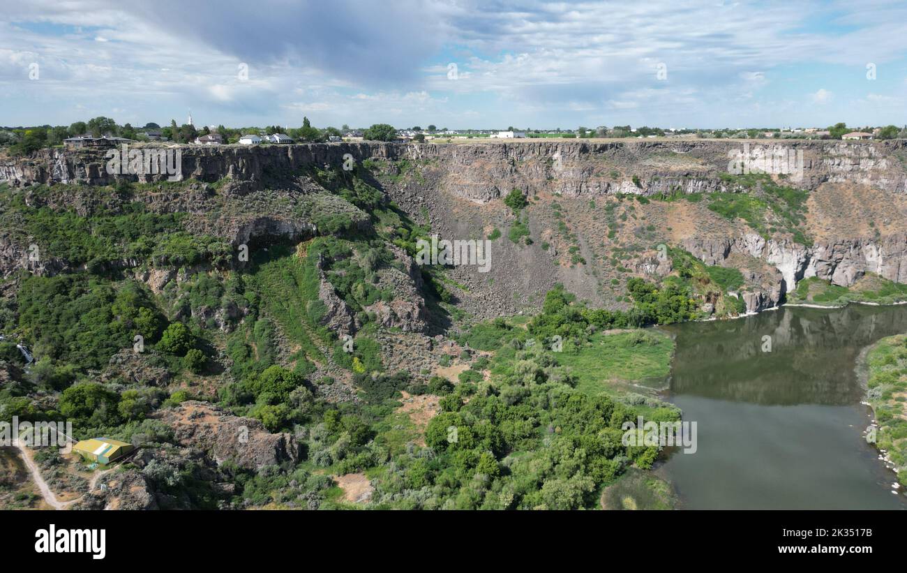 A beautiful view of a river surrounded by geological formations with ...