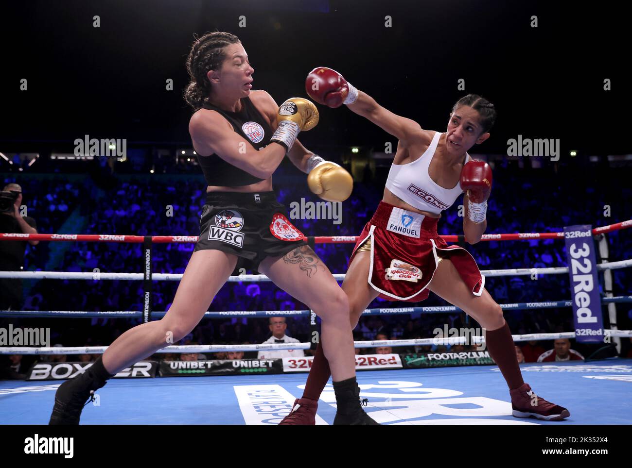Sarah Mahfoud (left) in action against Amanda Serrano in their WBO, WBC ...