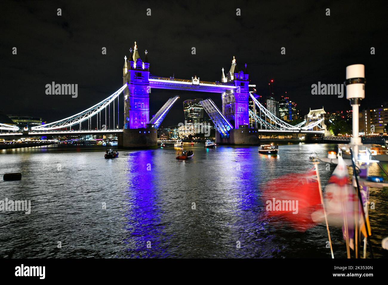 A flotilla of over 150 boats lit with fairy lights take part in a ...