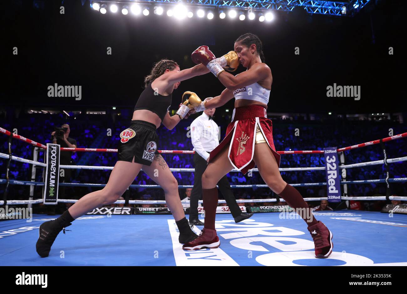 Sarah Mahfoud (left) in action against Amanda Serrano in their WBO, WBC, IBF AND IBO World ...