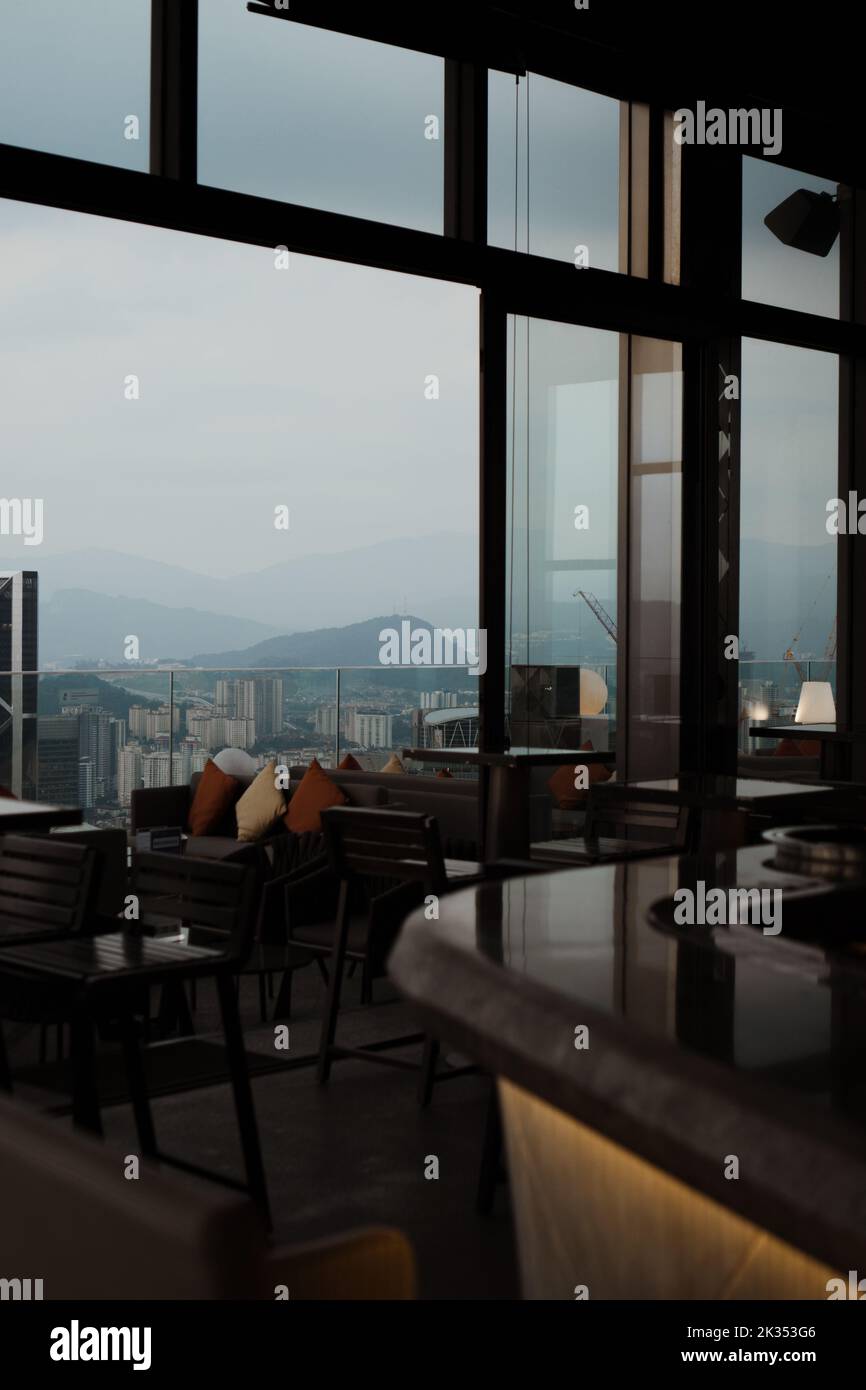 A vertical shot of a bar counter and rooftop bar interior in KLCC ...