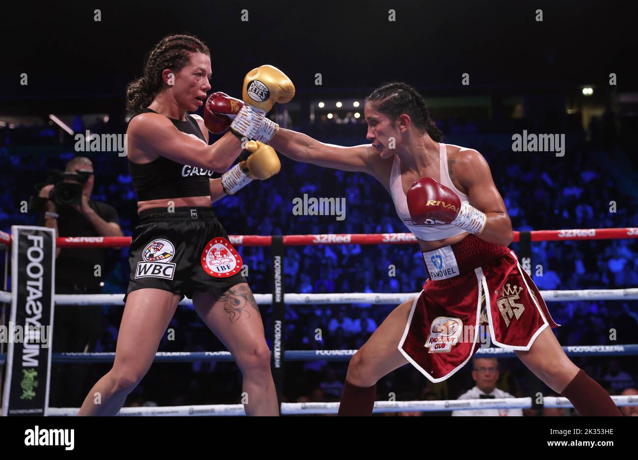 Sarah Mahfoud (left) in action against Amanda Serrano in their WBO, WBC, IBF AND IBO World ...