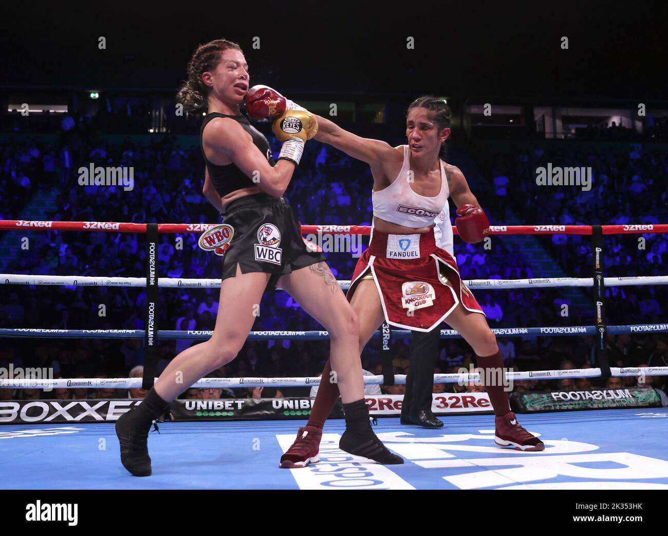 Sarah Mahfoud (left) in action against Amanda Serrano in their WBO, WBC, IBF AND IBO World ...