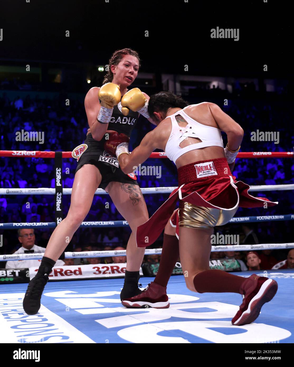 Sarah Mahfoud (left) in action against Amanda Serrano in their WBO, WBC, IBF AND IBO World ...