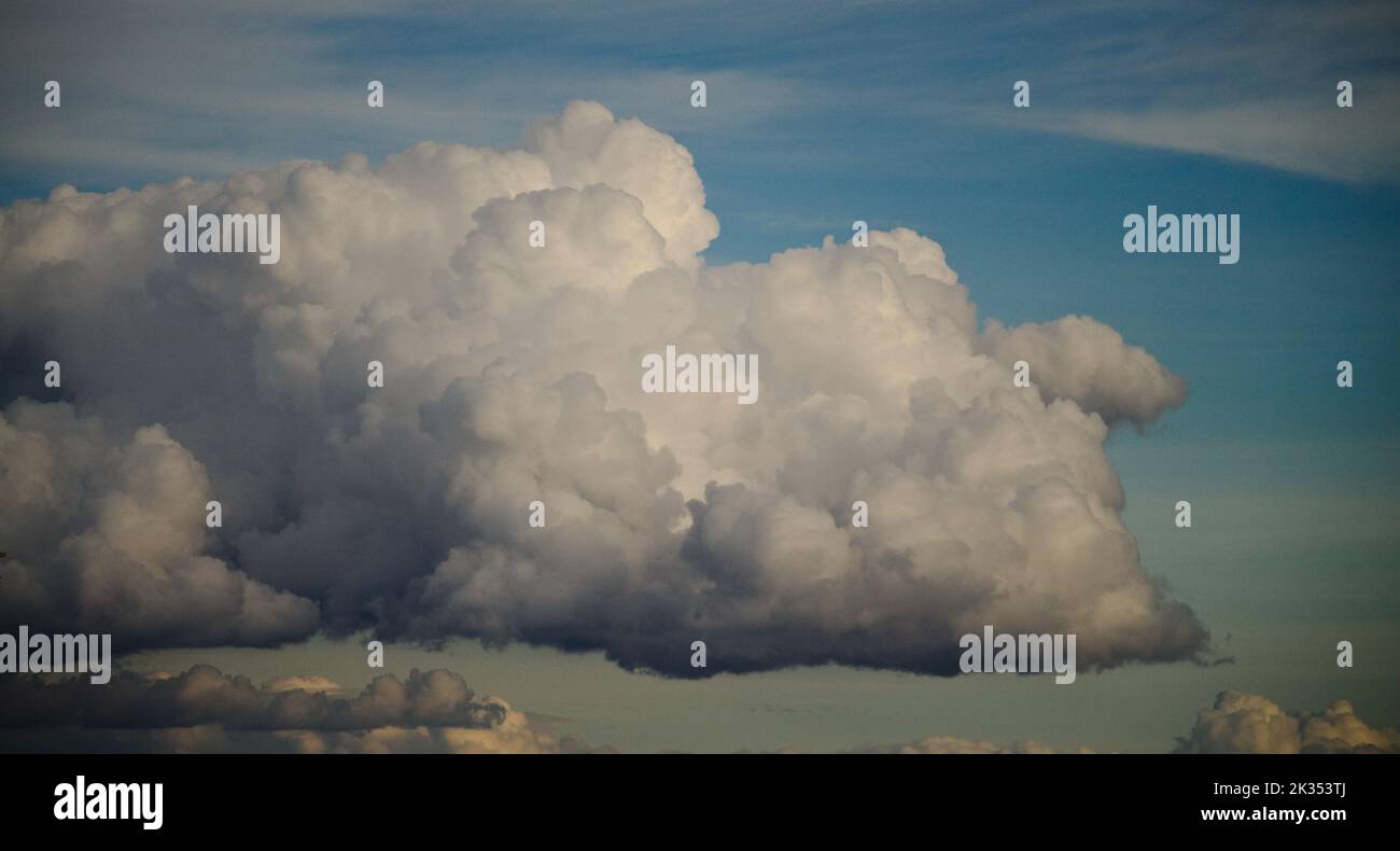 Blue sky with large cloud hi-res stock photography and images - Alamy