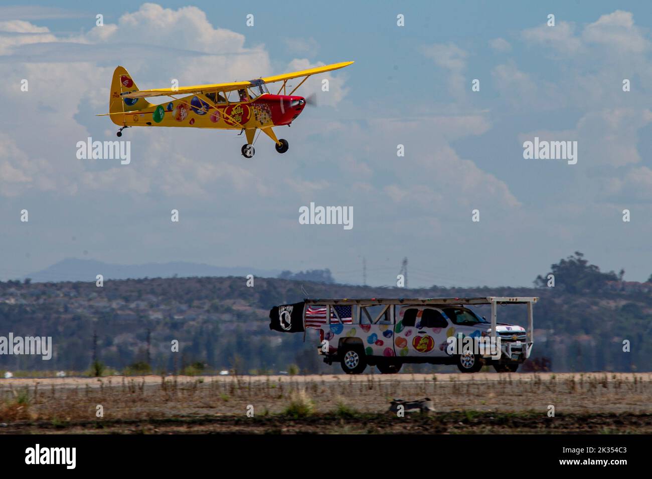 Kent Pietsch, piloting his Interstate Cadet, performs aerobatics during ...