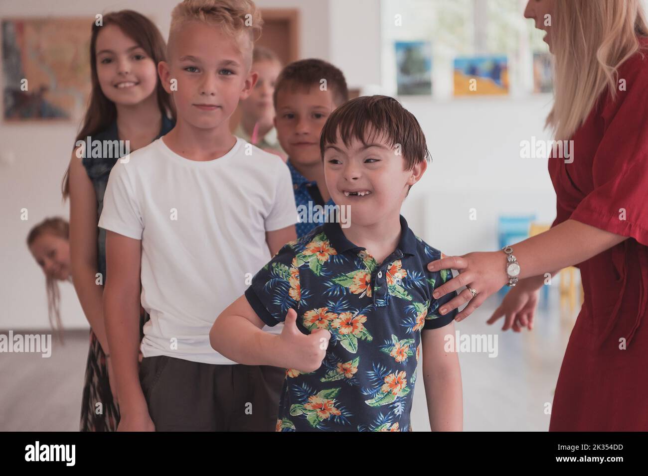 Preschool children wait in line for new and interesting games ...