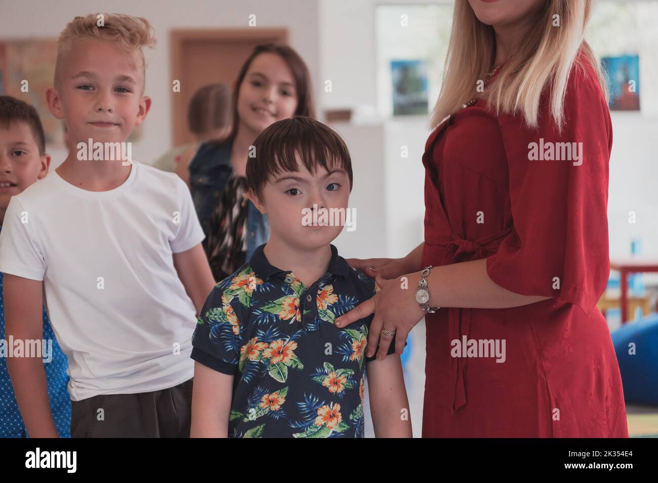 Preschool children wait in line for new and interesting games ...