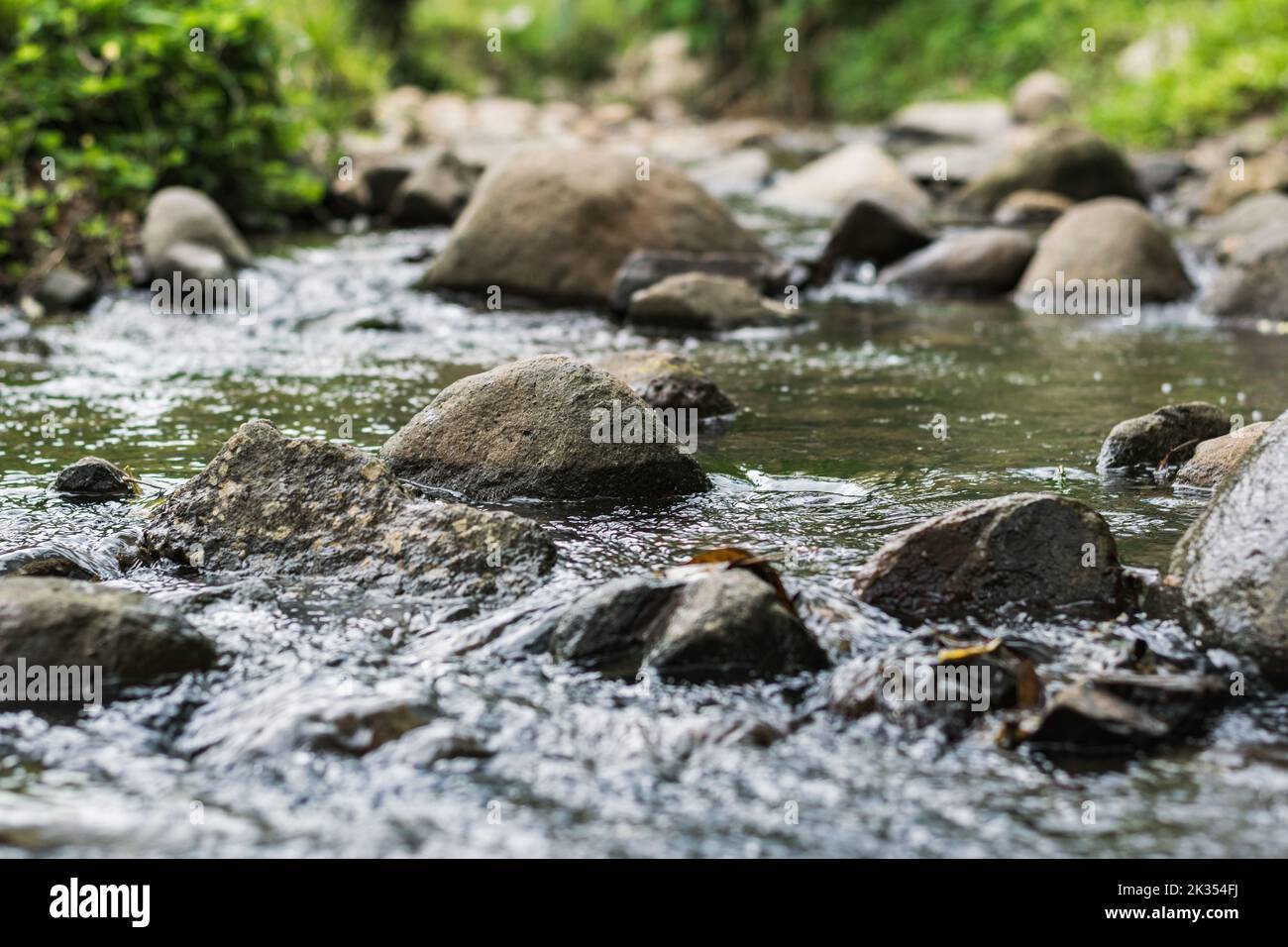 Running water through stones hi-res stock photography and images - Alamy