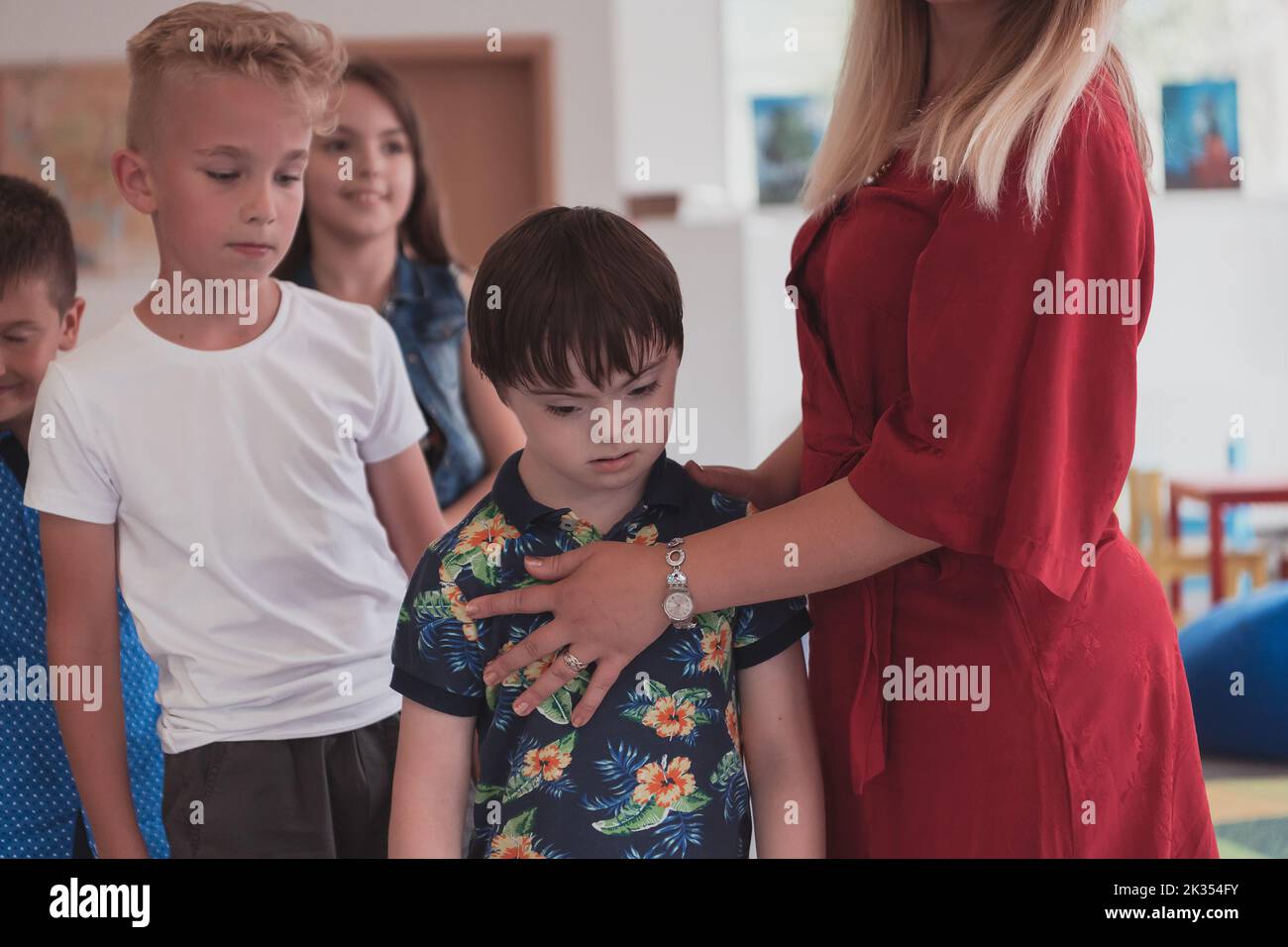Preschool children wait in line for new and interesting games ...